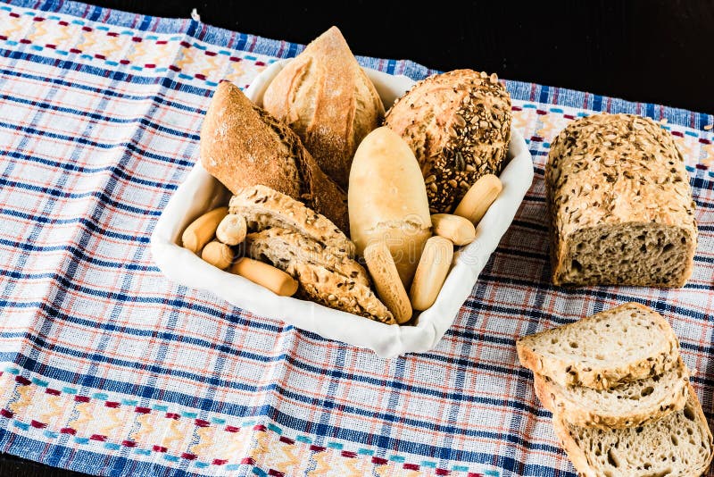 Different Types of Bread Cut into Slices and Whole Stock Photo - Image ...