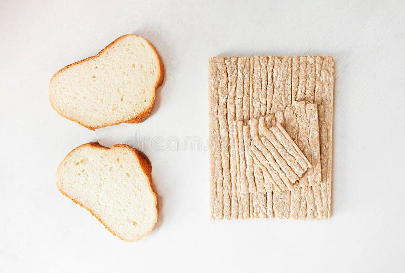 Different Types of Bread, White Yeast Bread and Healthy Crispbread on a ...