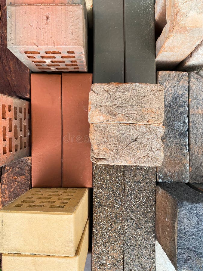 Different Types of Bricks Stacked Beautifully on Green Grass. Top View ...