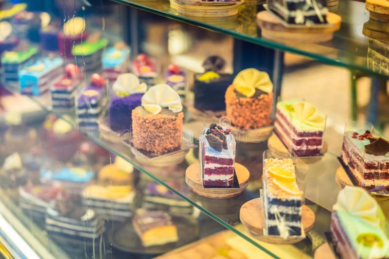 Different Types of Cakes in Pastry Shop Glass Display Stock Image ...