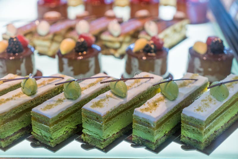 Different Types of Cakes in Pastry Shop Glass Display.in Bakery Shop ...