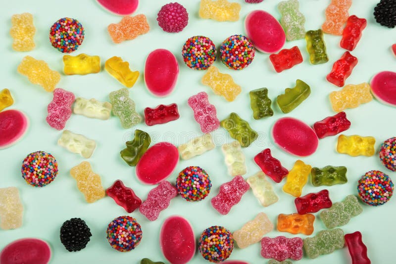 Different Types of Candies on Turquoise Background Editorial Stock ...