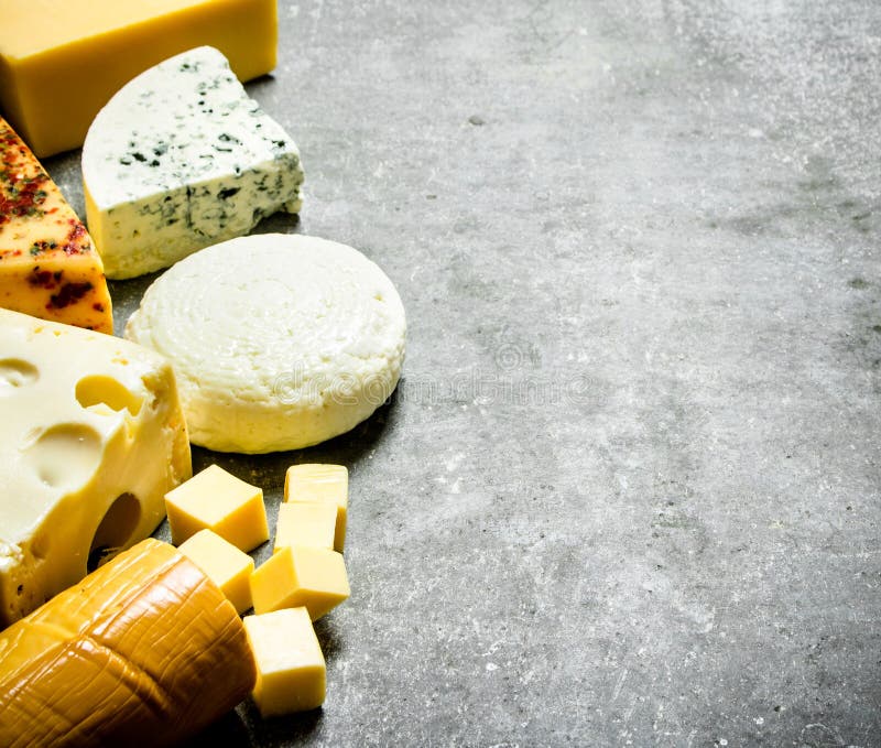 Different Types of Cheese. on Stone Table. Stock Image - Image of ...