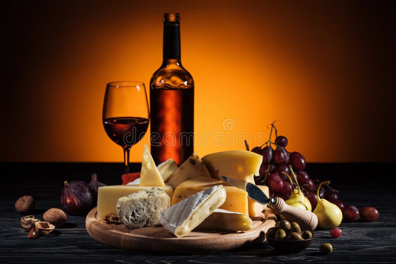 Different Types of Cheeses and Alcohol Drink on Table Stock Image ...