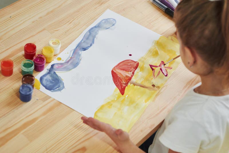 Different Types of Colors. Little Girl is Drawing by Using Gouache and ...