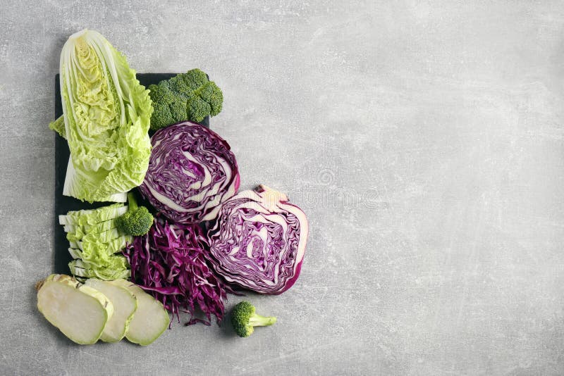 Different Types of Cut Cabbage on Light Grey Table, Flat Lay. Space for ...