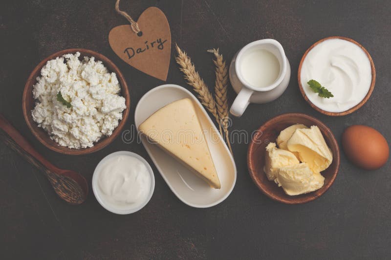 Different Types of Dairy Products on Dark Background, Top View, Stock ...