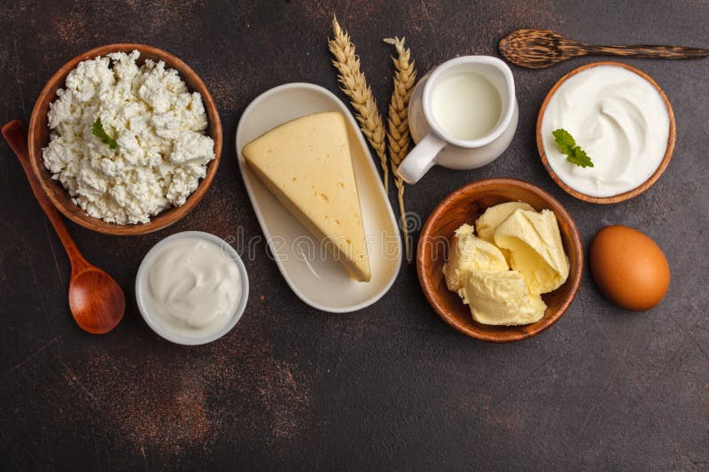 Different Types of Dairy Products on Dark Background, Top View, Stock ...
