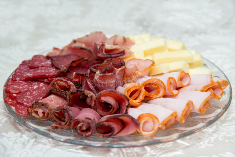 Different Types Delicacies of Meat and Cheese Arranged in a Plate Over ...