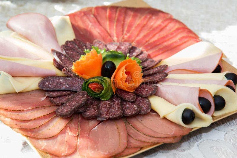 Different Types Delicacies of Meat and Cheese Arranged in a Plate Over ...