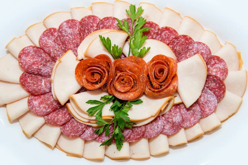 Different Types Delicacies of Meat and Cheese Arranged in a Plate Over ...