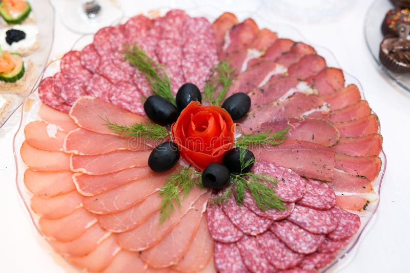 Different Types Delicacies of Meat and Cheese Arranged in a Plate Over ...