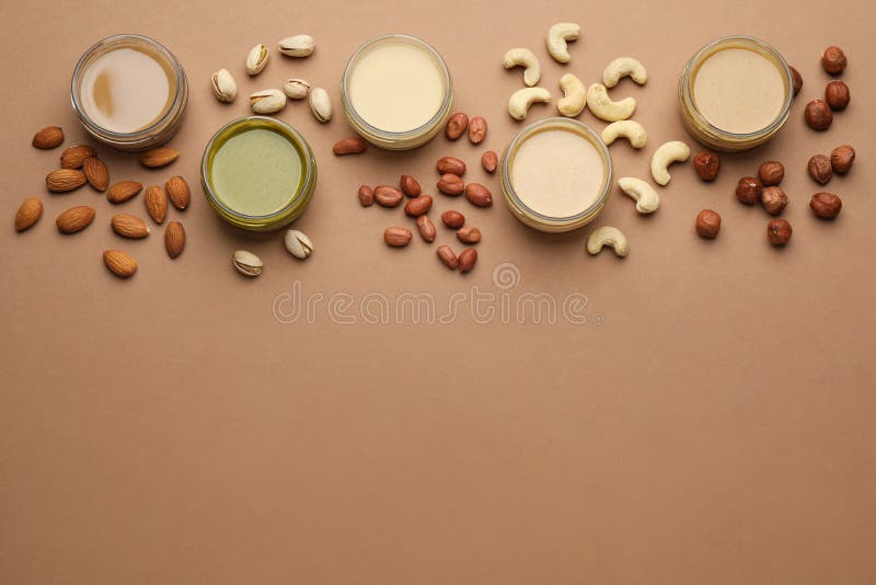 Different Types of Delicious Nut Butters and Ingredients on Brown ...