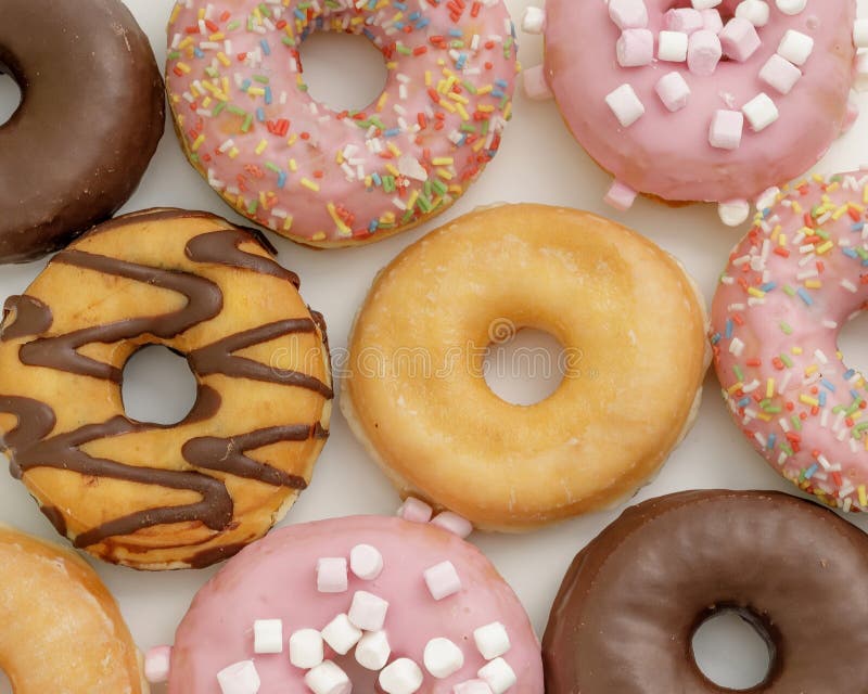 Different Types of Donuts on a Background Stock Image - Image of ...