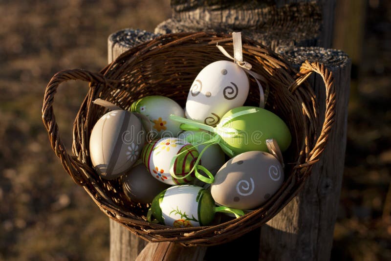 Different Types of Eggs in a Basket on a Wooden Surface Stock Photo ...