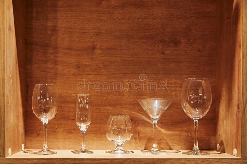 Different Types of Empty Glasses on a Wooden Background Stock Photo ...