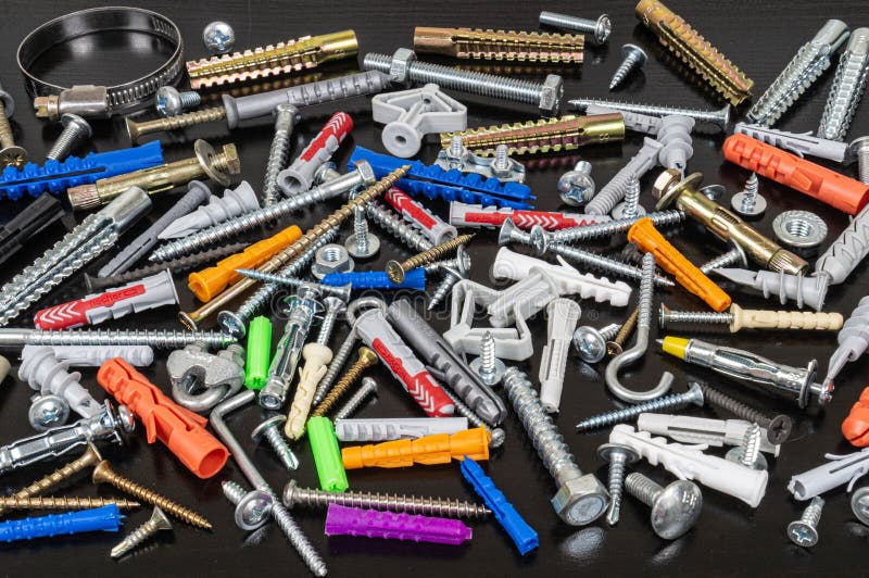 Different Types of Fasteners on a Dark Wood Background. Stock Photo ...