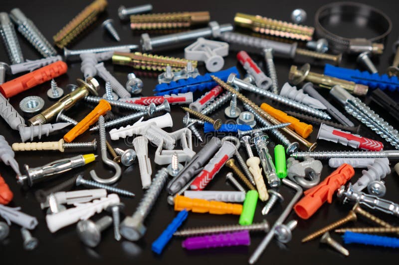 Different Types of Fasteners on a Dark Wood Background. Stock Photo ...
