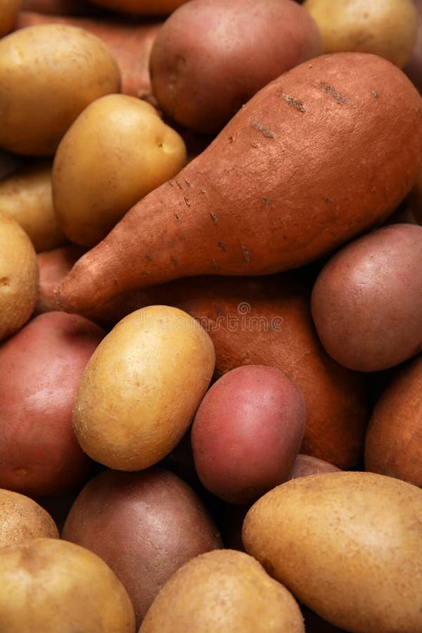 Different Types of Fresh Potatoes As Background, Closeup View Stock ...