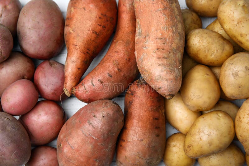Different Types of Fresh Potatoes on White Table, Top View Stock Image ...