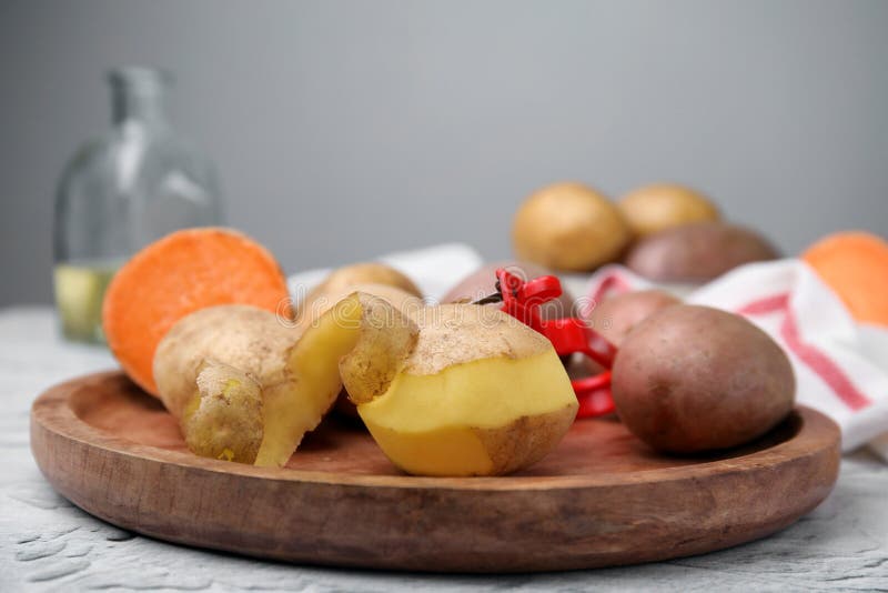 Different Types of Fresh Potatoes on White Textured Table, Closeup ...