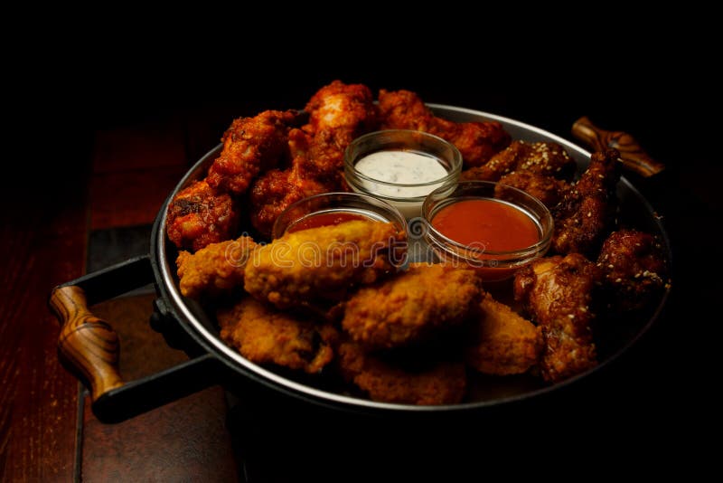 Different Types of Fried Meat and Sauces in a Plate. Stock Photo ...