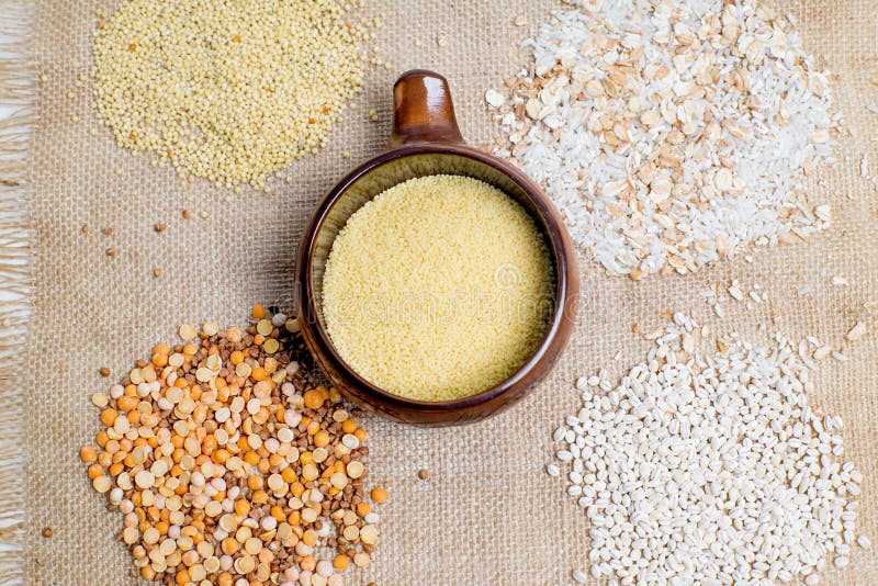 Different Types of Groats in Pots on a White Background Stock Photo ...