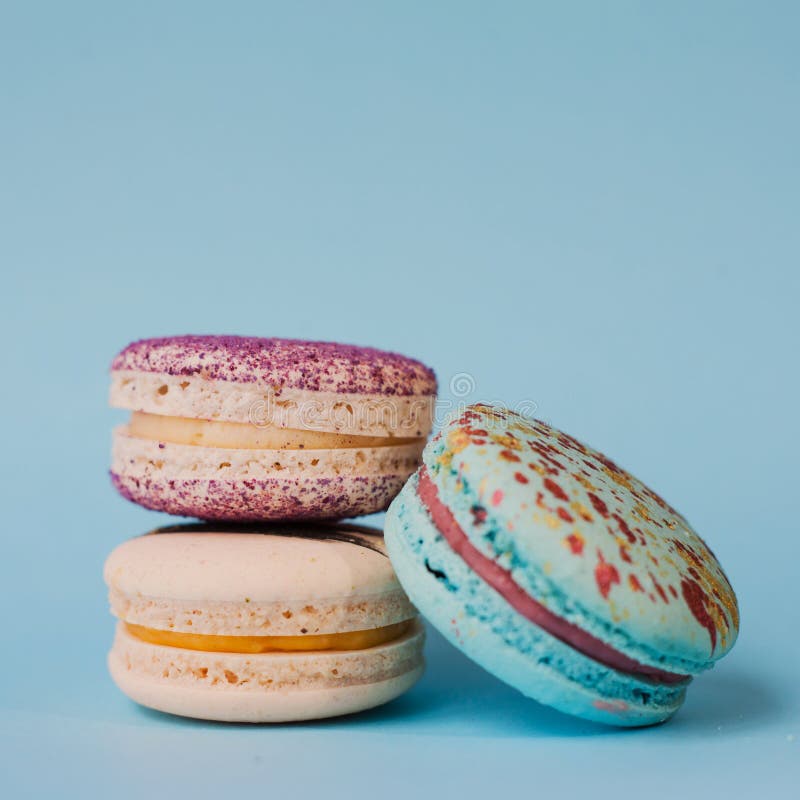 Different Types of Macaroons on a Blue Background Stock Image - Image ...