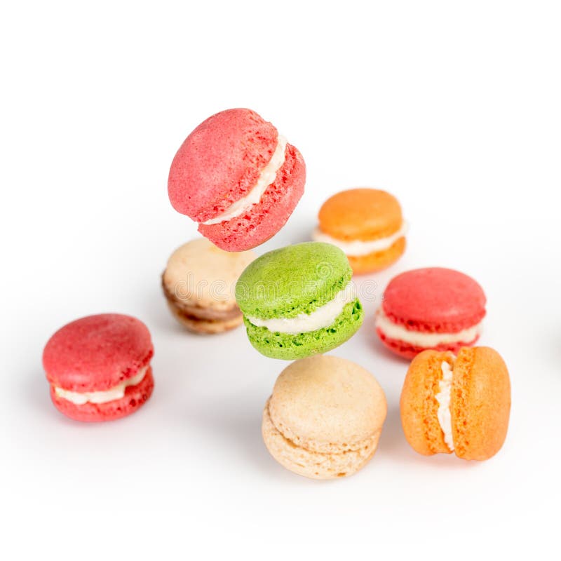 Different Types of Macaroons in Motion Falling or Flying on White ...