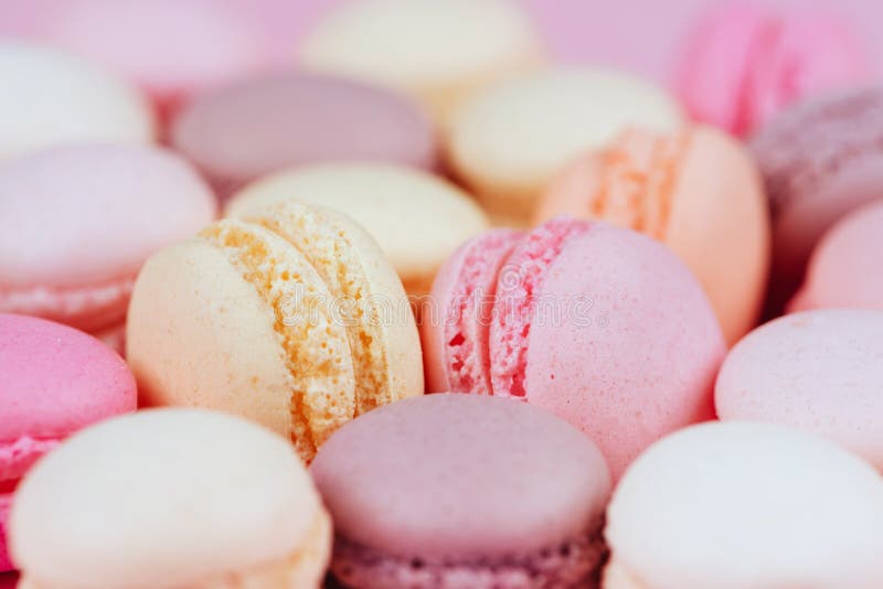 Different Types of Macaroons on Pink Background. Stock Image - Image of ...
