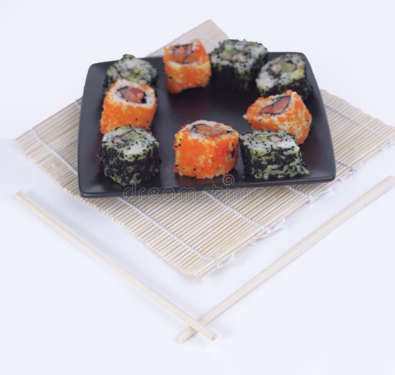 Different Types of Maki Sushi on a Black Plate Stock Photo - Image of ...