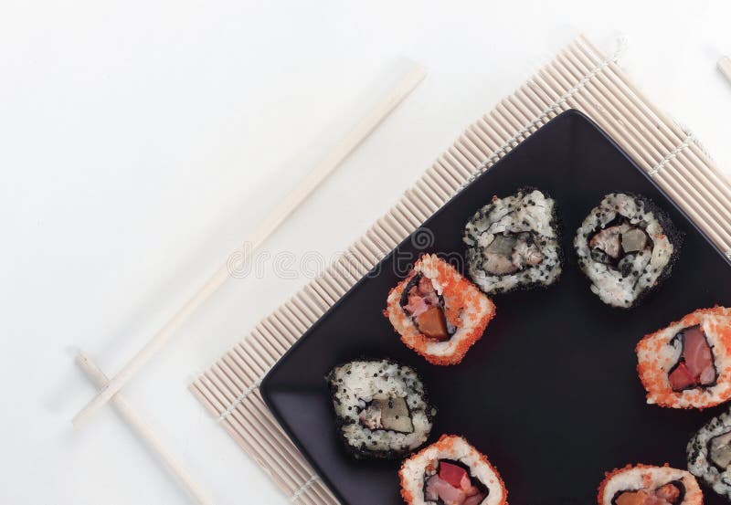 Different Types of Maki Sushi on a Black Plate Stock Image - Image of ...