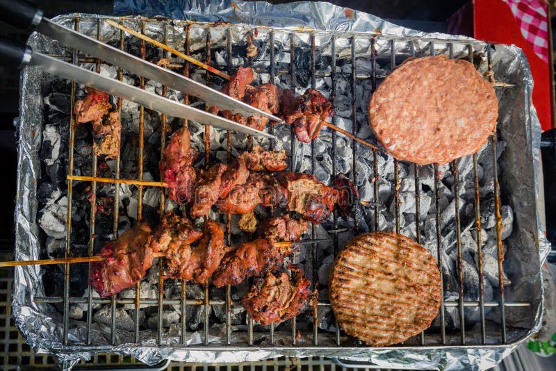 Different Types of Meat are Cooked on the Grill Stock Photo - Image of ...