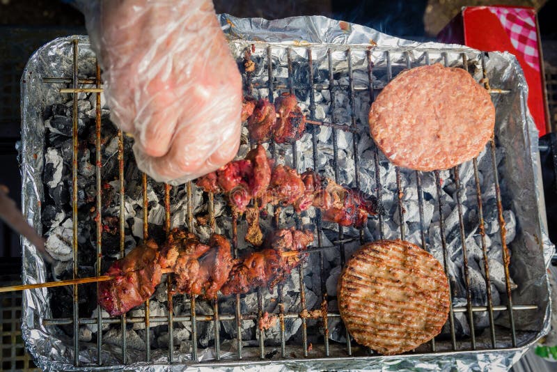 Different Types of Meat are Cooked on the Grill Stock Photo - Image of ...