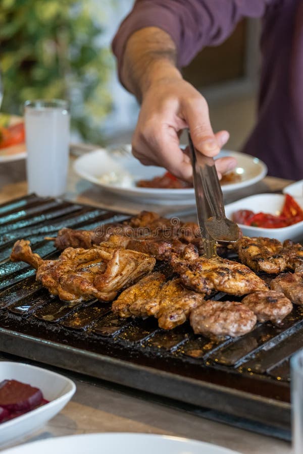 Different Types of Meat Grilled on Barbecue on the Table, Served with ...