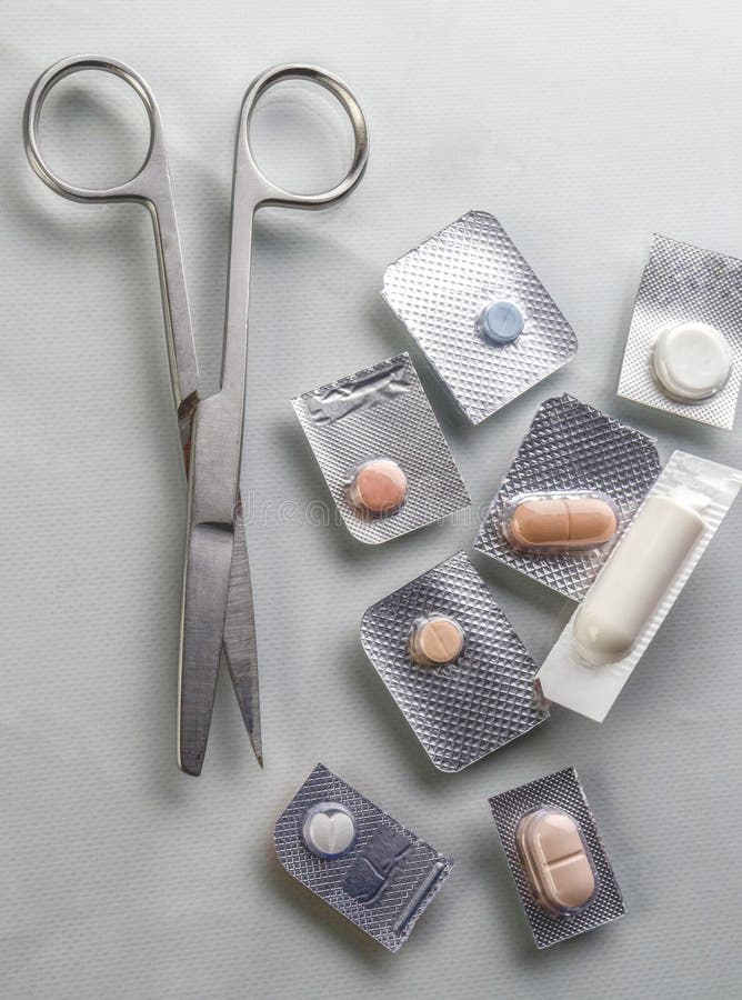 Different Types of Medications with Scissors in a Hospital Stock Photo ...