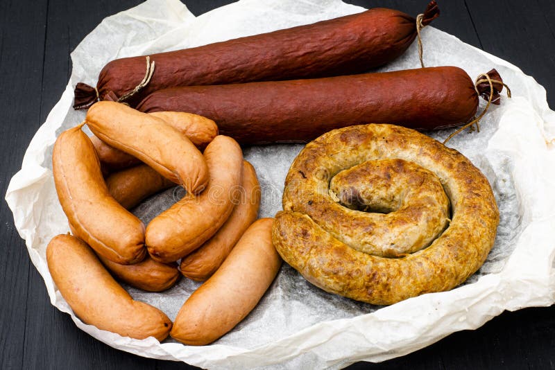 Different Types of Natural Sausages on a Wooden Background Stock Photo ...
