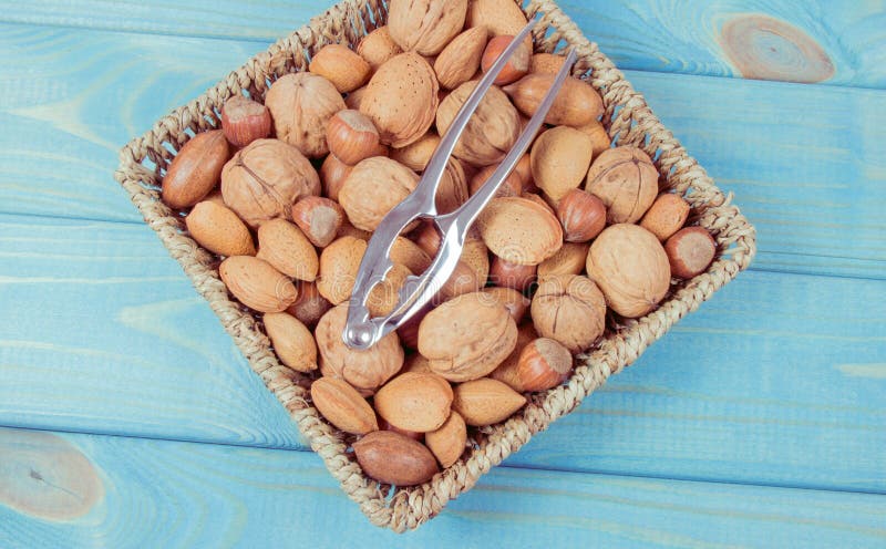 Different Types of Nuts in a Shell on a Wooden Background. Stock Image ...