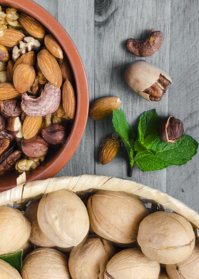 Different Types of Nuts, Walnuts on a Black and White Wooden Background ...
