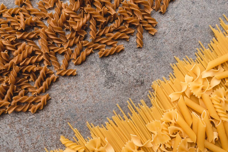 Dark and Light Pasta Arranged at an Angle. Arranged on an Interesting ...