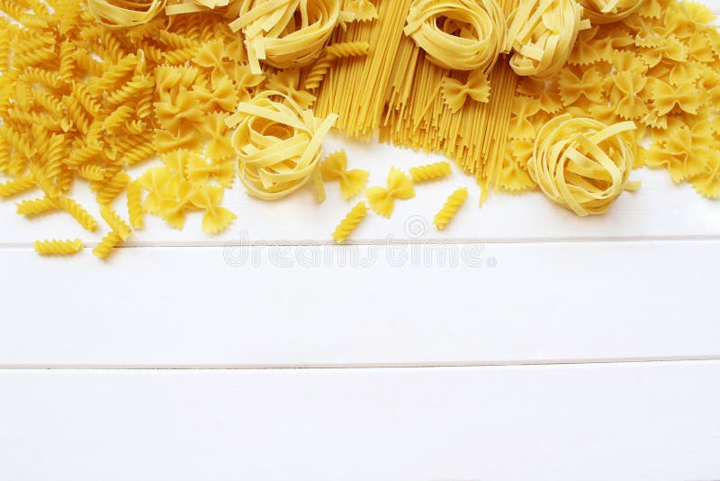 Different Types of Pasta on Wood Background Stock Photo - Image of ...