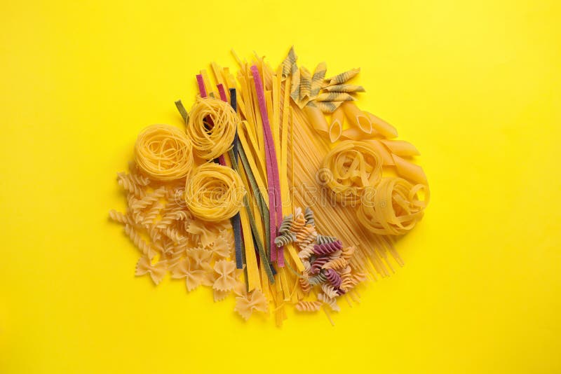 Different Types of Pasta on Yellow Background, Flat Lay Stock Photo ...