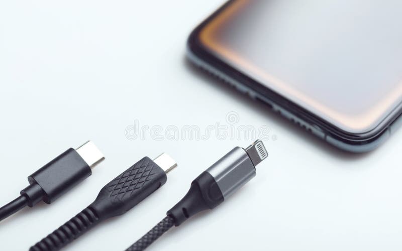 Different Types of Phone Charging Cables are Lined Up Next To a ...