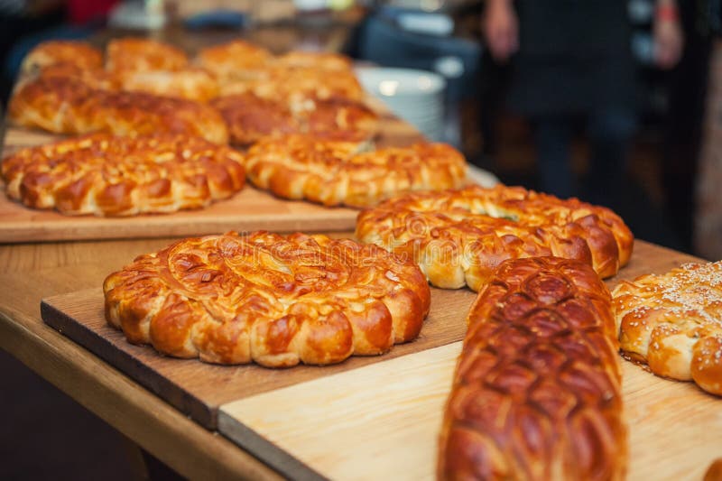 Different Types of Pies in Pastry Shop on the Wooden Display. Selective ...