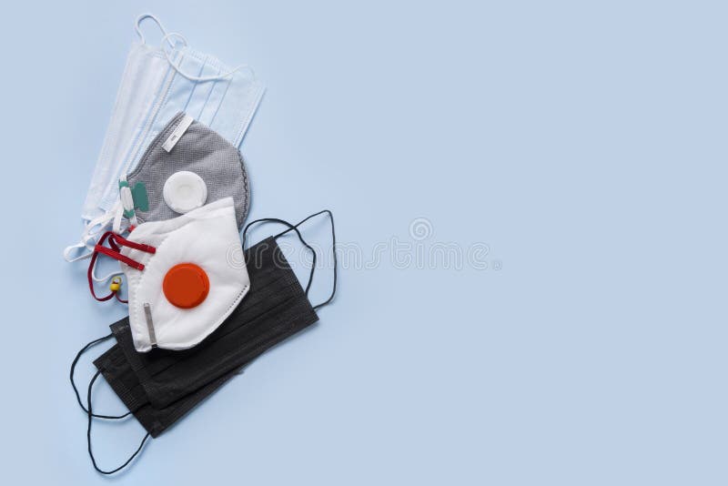 Different Types Protective Medical Face Mask on Blue. View from Above ...