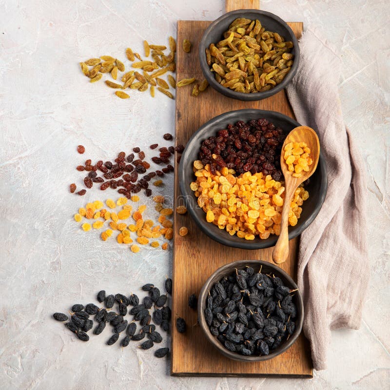 Different Types of Raisins on Light Backgroound Stock Photo - Image of ...