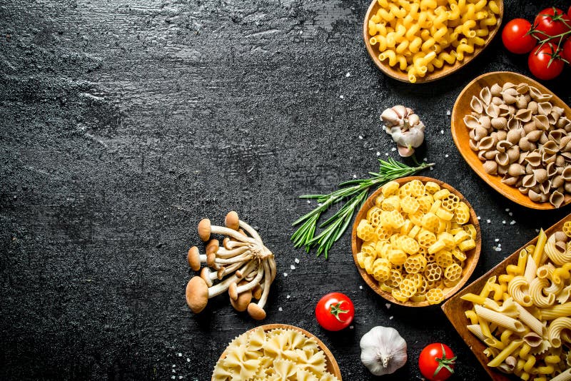 Different Types of Raw Paste in Bowls with Mushrooms, Rosemary and ...