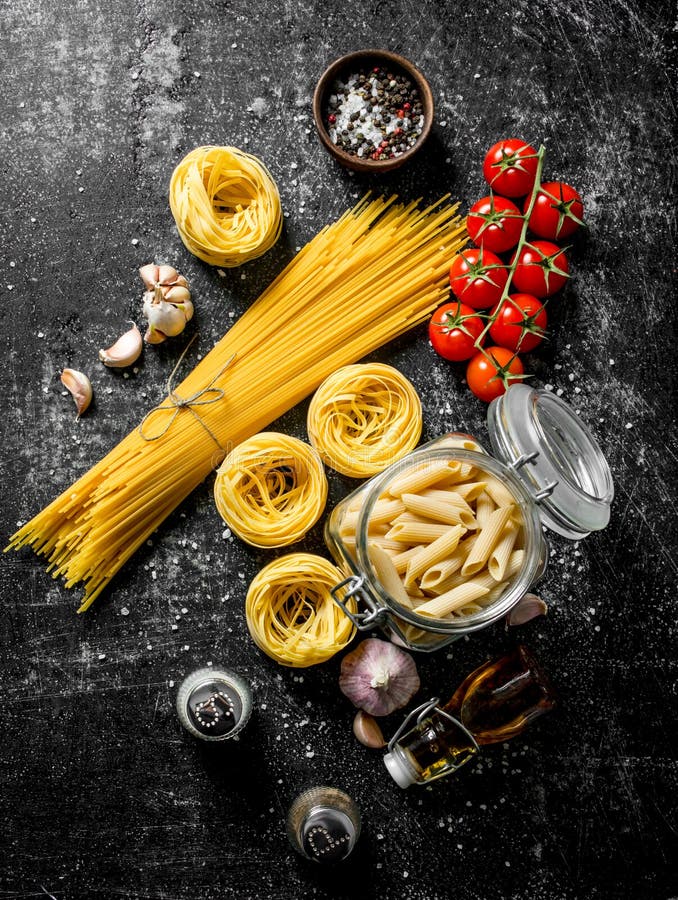 Different Types of Raw Paste with Oil, Tomatoes and Spices Stock Photo ...