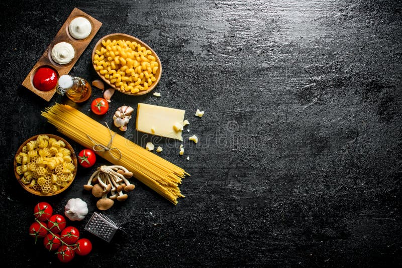 Different Types of Raw Paste with Parmesan, Mushrooms and Tomatoes ...