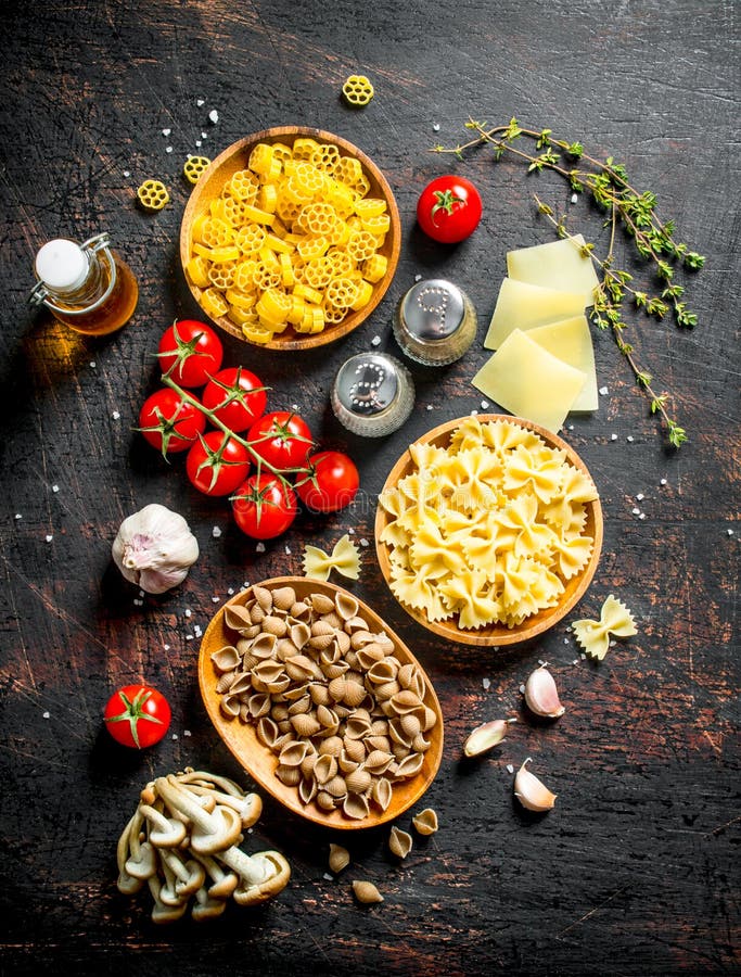 Different Types of Raw Paste with Thyme, Tomatoes and Mushrooms Stock ...